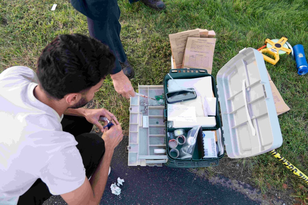 Davenport Forensics Class Gets Hands On Experience Processing Mock
